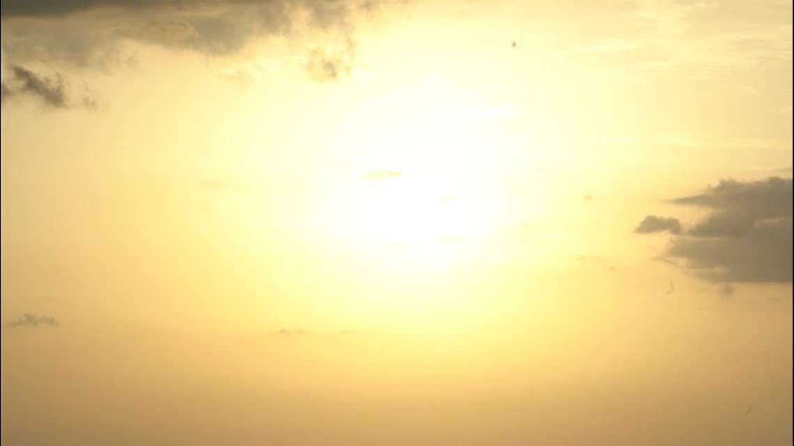 Saharan dust produces stunning beach sunset | 9news.com