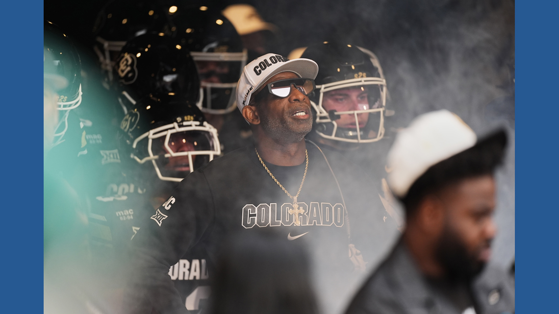 Colorado fans storm field after win over No. 22 Iowa State, Deion ...