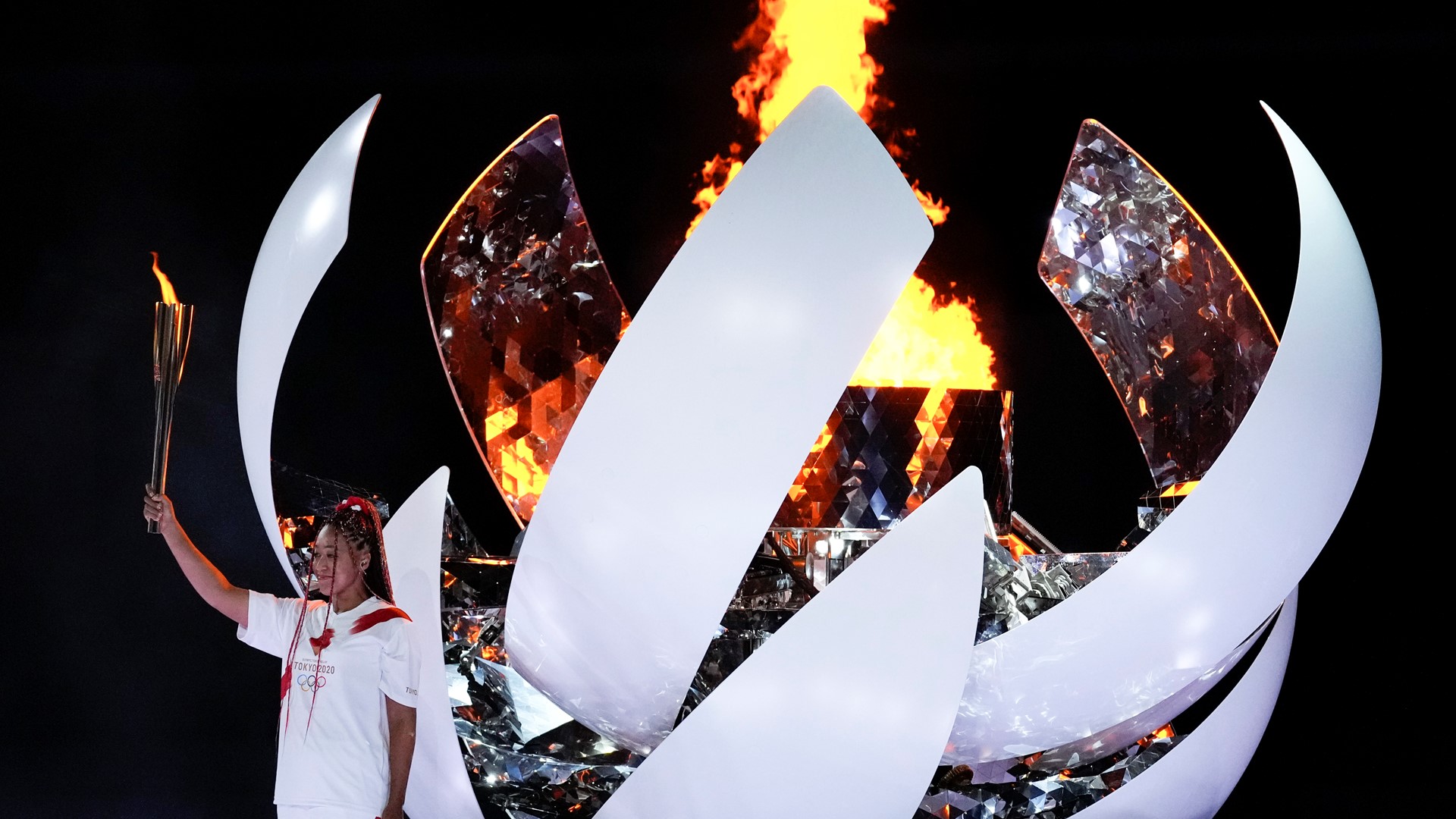 Who is lighting the Olympic cauldron at the Opening Ceremony? | 9news.com