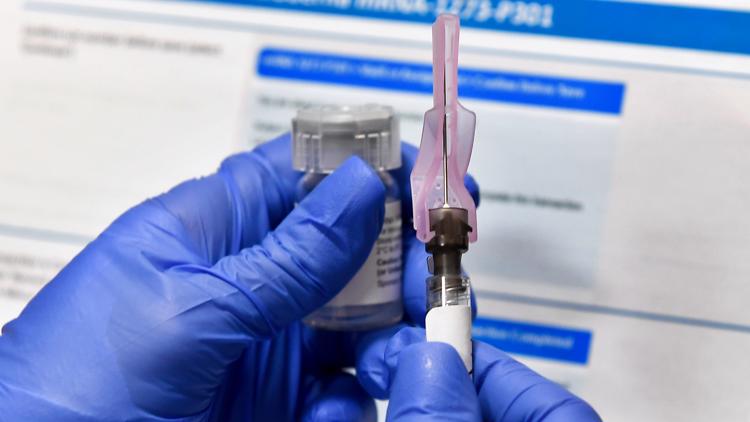 FDA gives Moderna COVID-19 vaccine emergency approval | 9news.com