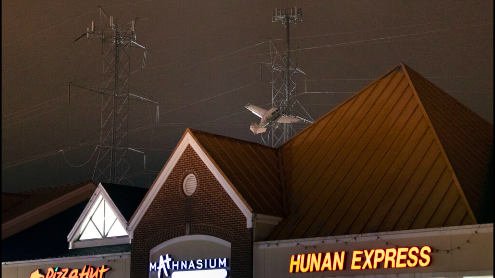 2 rescued from plane caught in Maryland power lines after crash | 9news.com