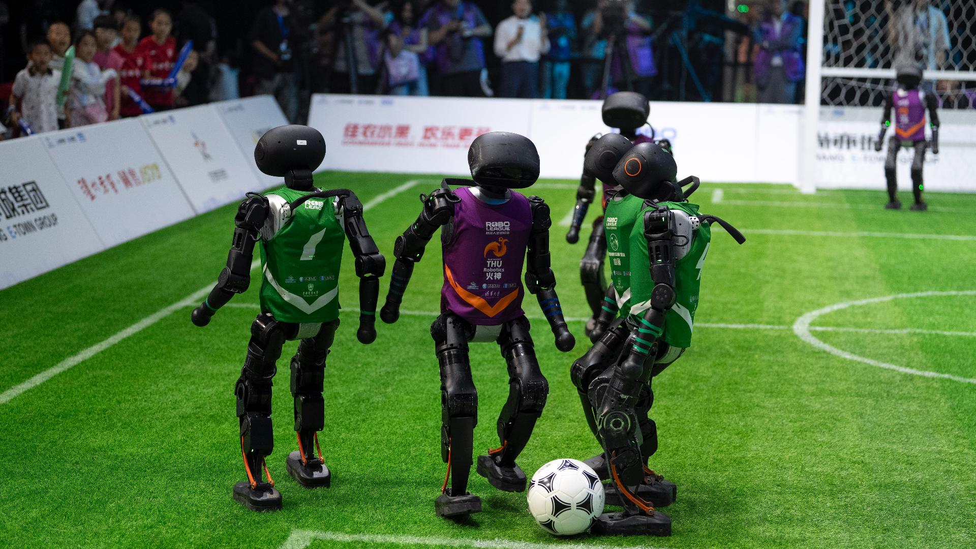 Humanoid robots impress fans with fully autonomous soccer match in ...