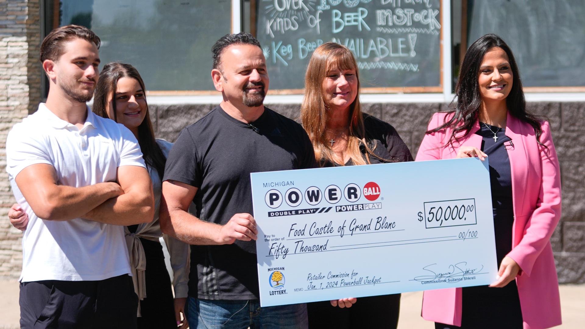 Powerball winners from New Year's day jackpot claim prize | 9news.com