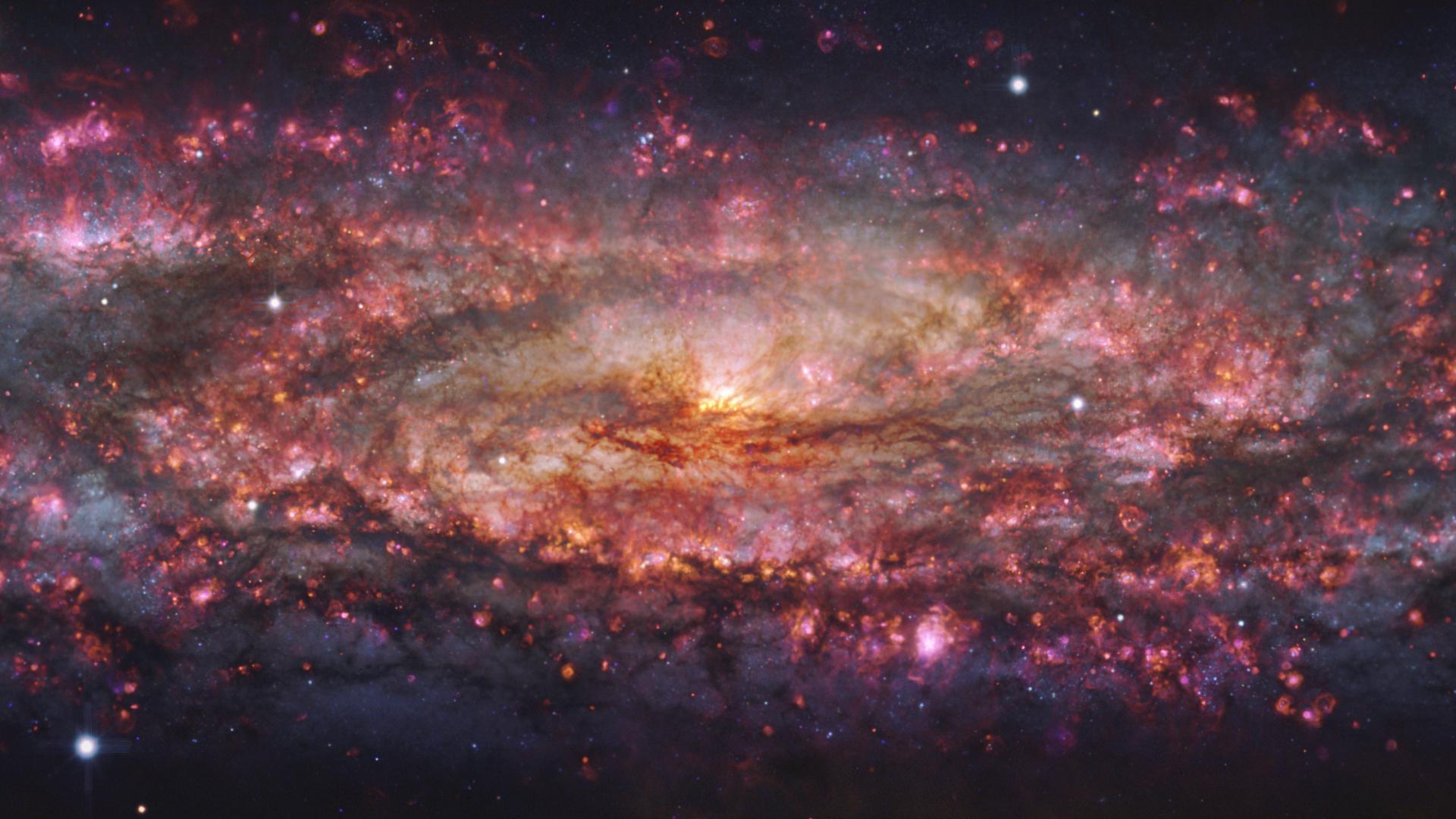 Astronomers Unveil Dazzling Sculptor Galaxy Image