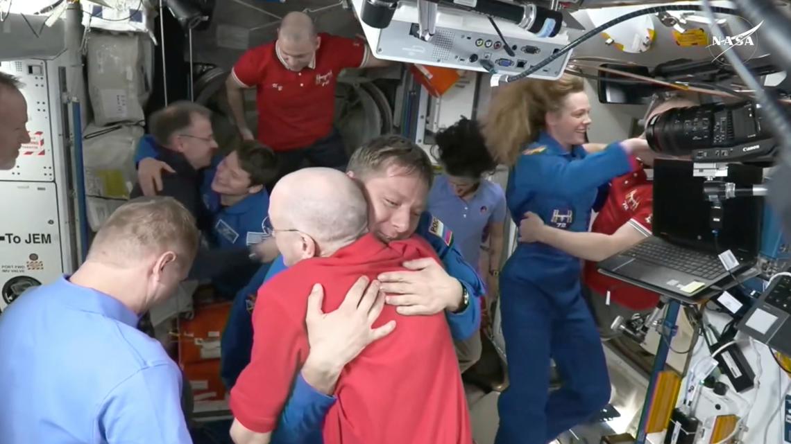 NASA's stuck astronauts greet newly arrived crew to the space station | 9news.com