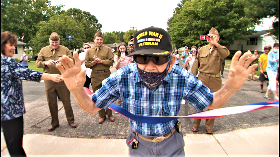 100-year-old MN WWII vet crosses finish line on 100-mile walk for ...