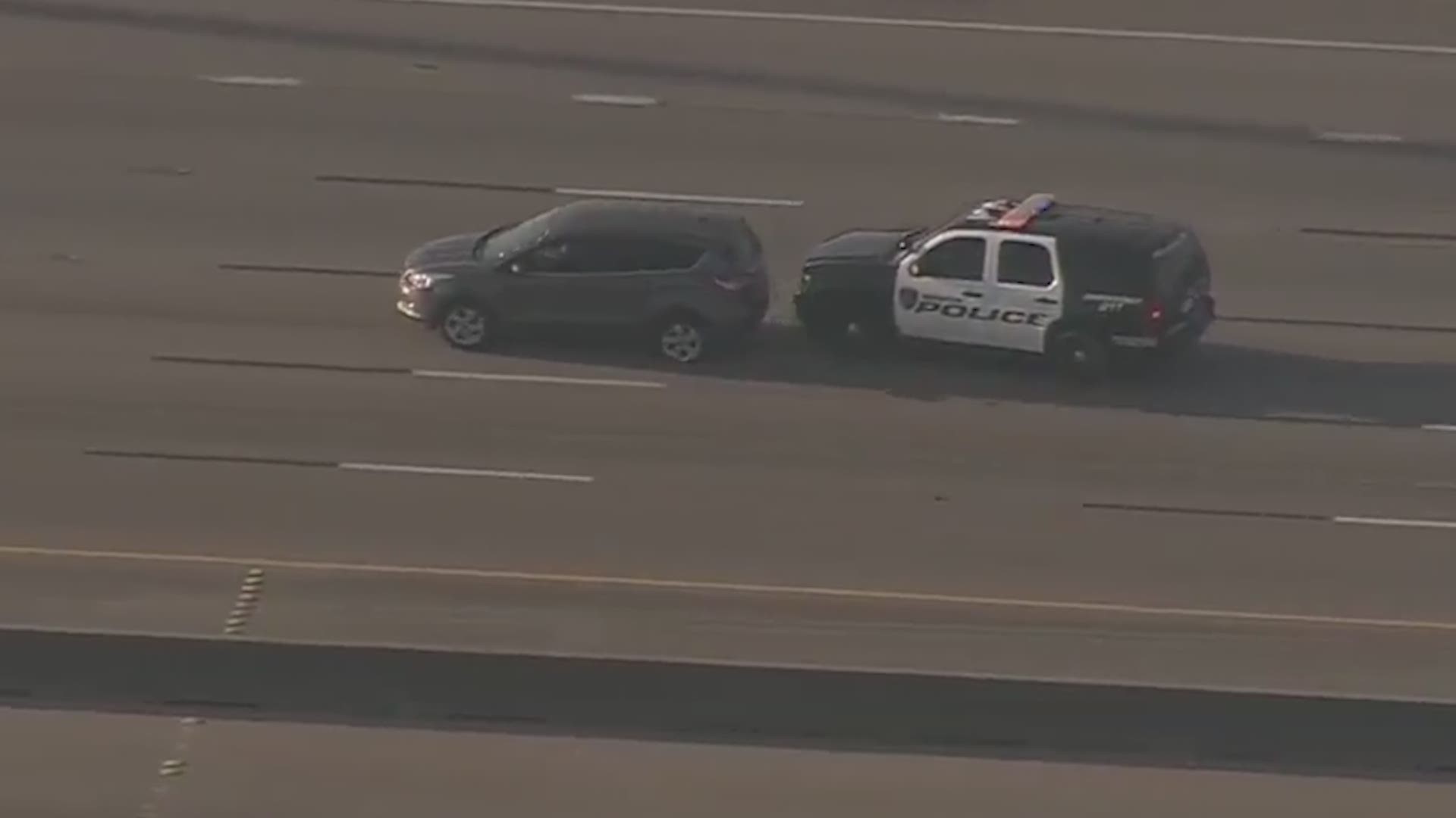 Assault suspect leads police on bizarre slow-speed chase | 9news.com