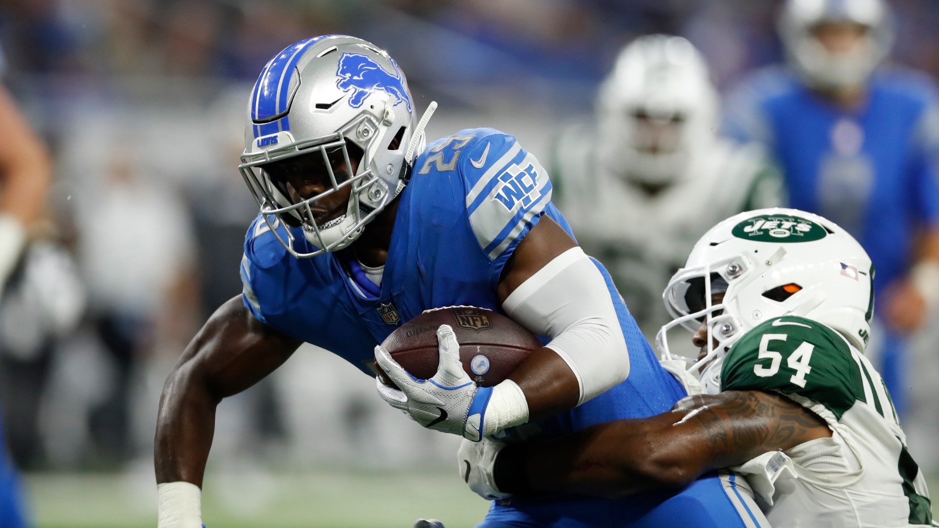 Broncos visit with running back Theo Riddick, now wait | 9news.com