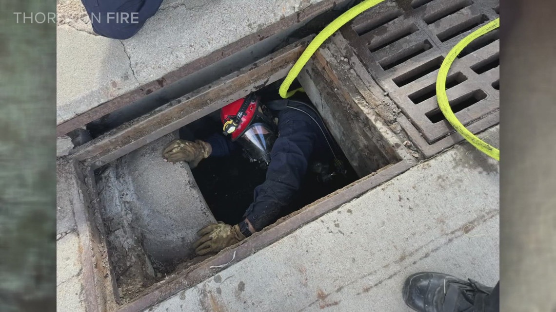 Colorado firefighters rescue man trapped in storm drain | 9news.com