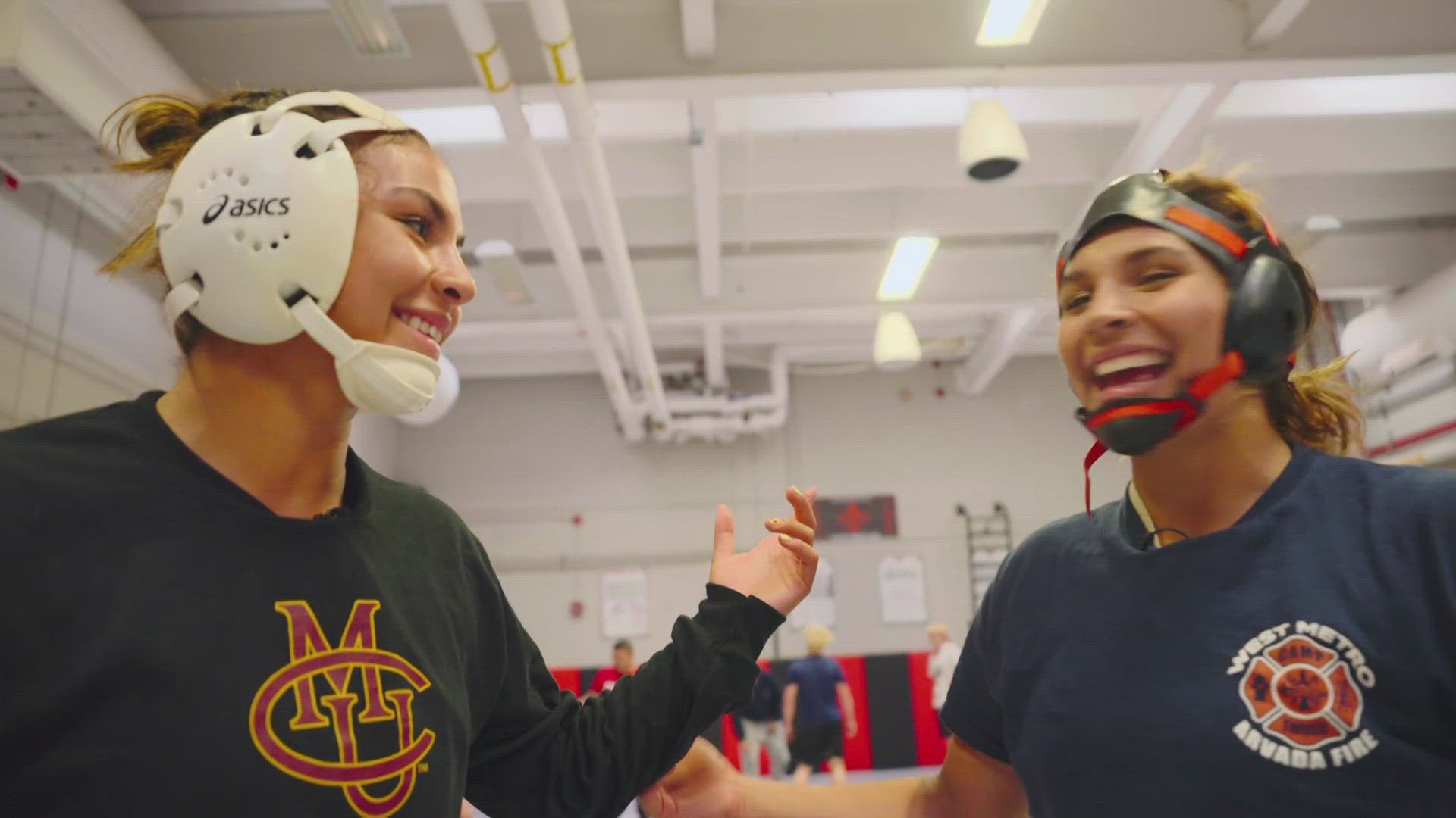 Twin Colorado wrestlers leave their mark on a growing sport | 9news.com