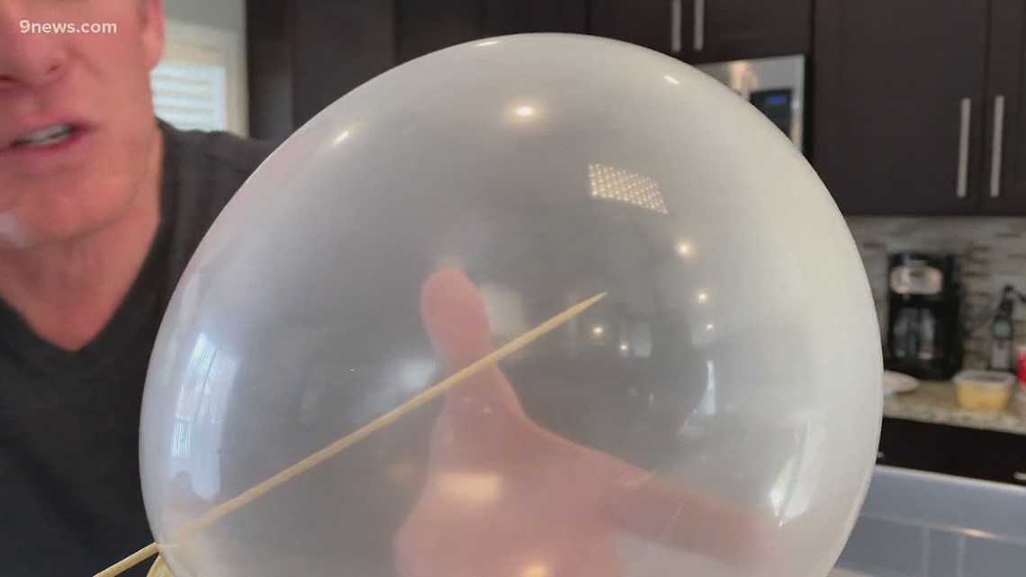 Science experiment: Putting a skewer through a balloon | 9news.com