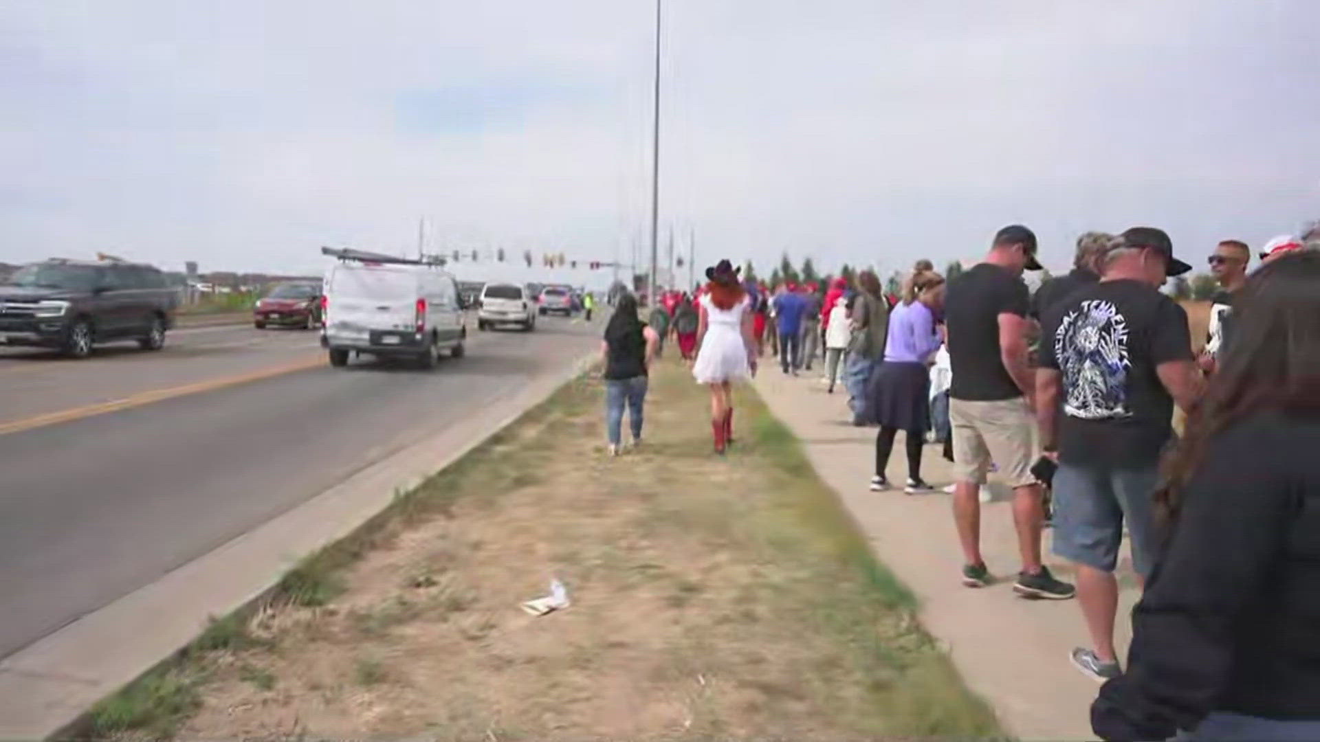 Attendees line up for Donald Trump campaign rally in Aurora | 9news.com