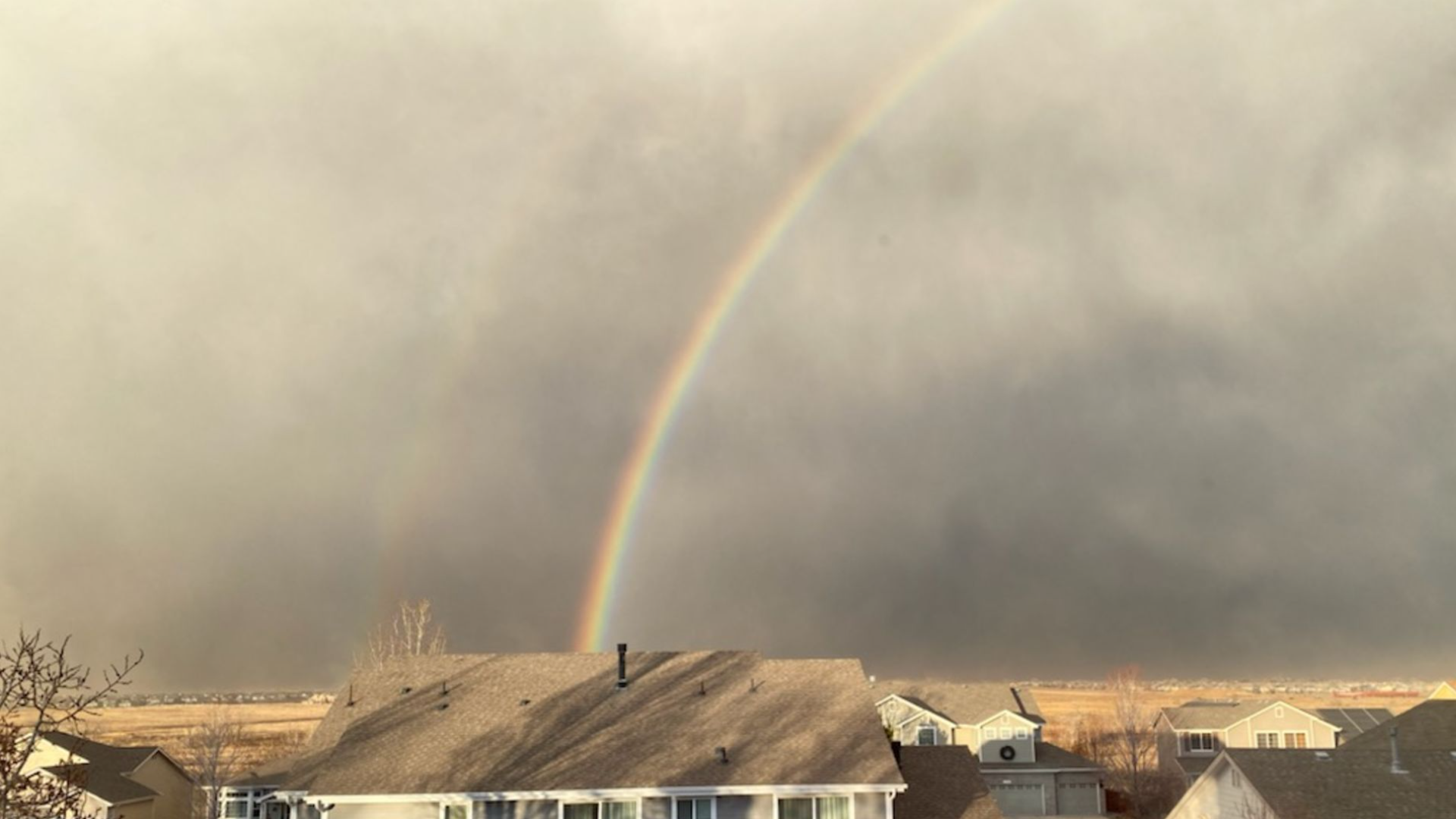 Wind, snow storm arrives in Colorado with rainbow seen in Denver ...