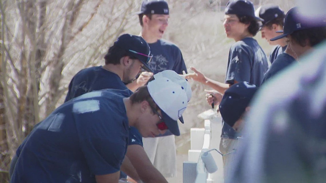 Columbine Students repaint fence for memorial garden at nursing home ...