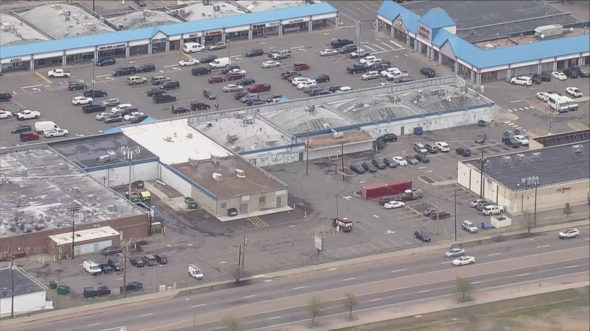 Aurora parking lot shooting kills woman | 9news.com