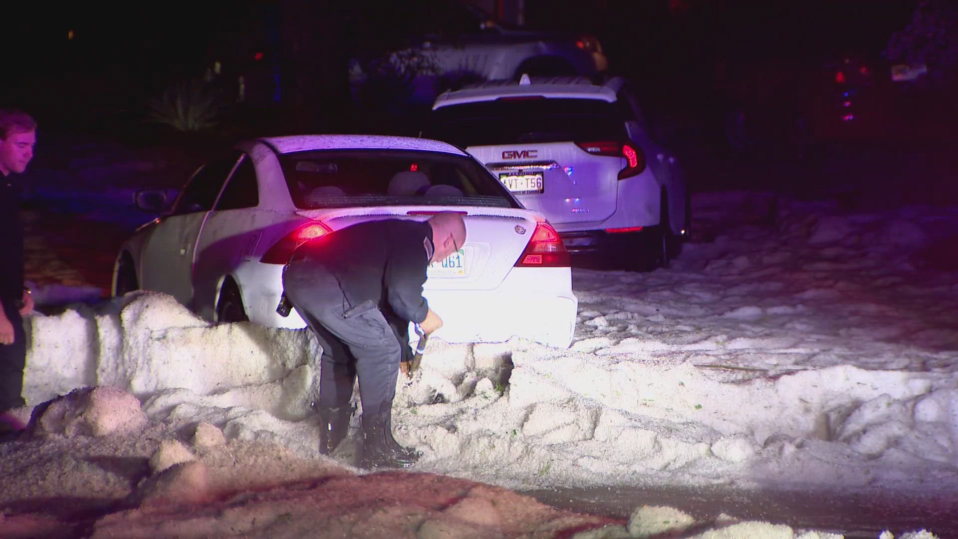 City crews spent day clearing out piles of hail from Aurora streets ...