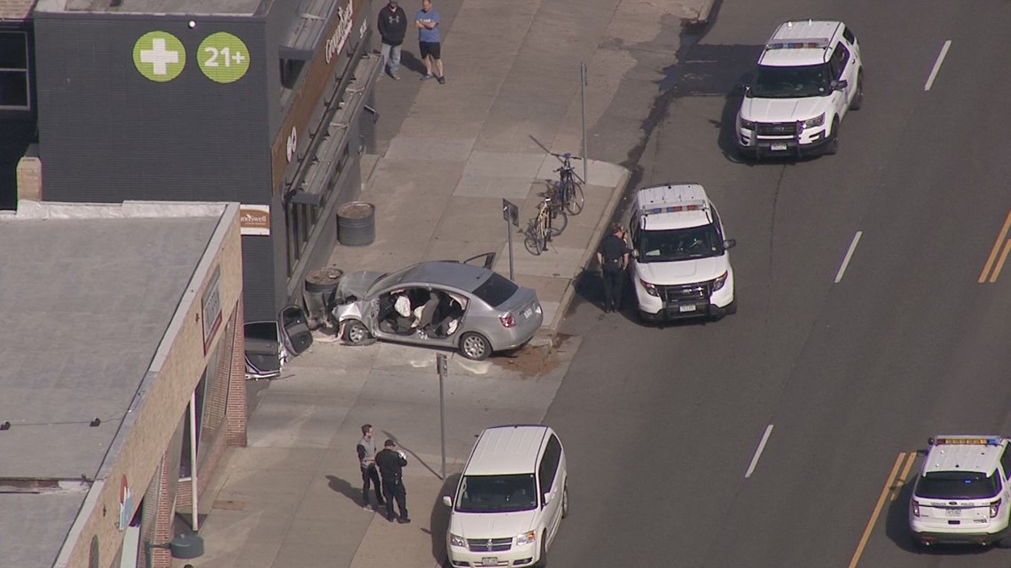 DPD on scene after car hits pedestrian and then a building | 9news.com