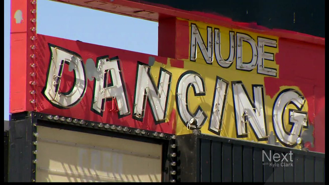 An effort to save the neon sign that once belong to PT's All Nude Club ...