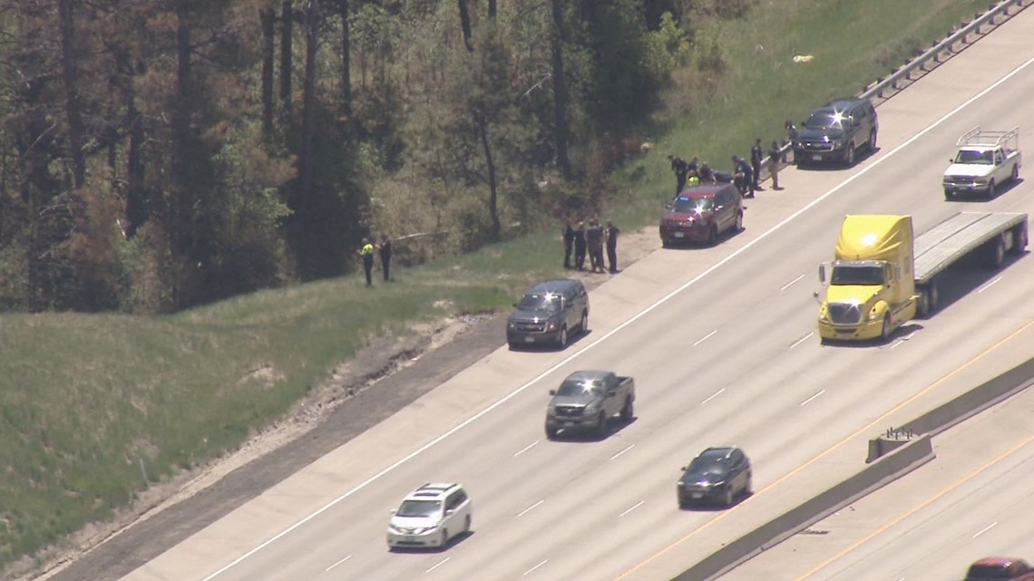 PHOTOS | Stolen FedEx crashes on side of I-25 | 9news.com
