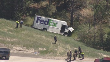 PHOTOS | Stolen FedEx crashes on side of I-25 | 9news.com
