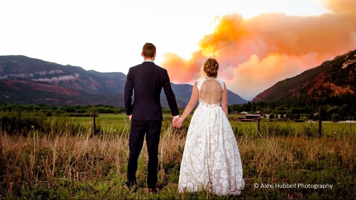 Couple takes vivid wedding photos with 416 Fire as backdrop | 9news.com