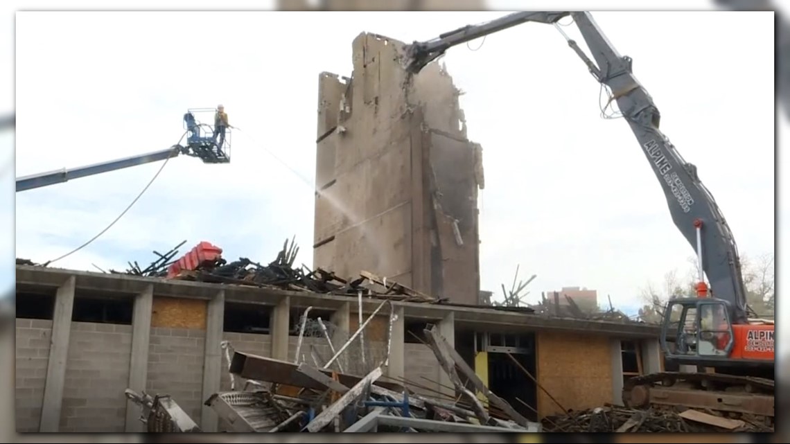 Demolition crew starts to remove what's left of burnt construction site ...