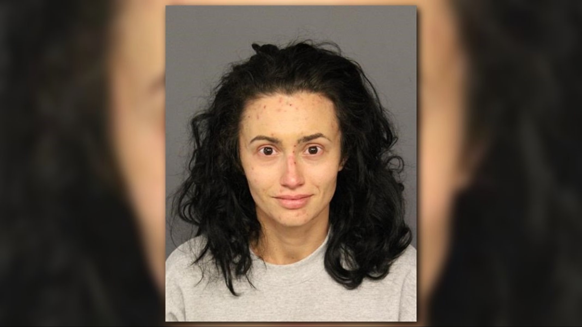 Woman charged in homicide outside donut shop | 9news.com