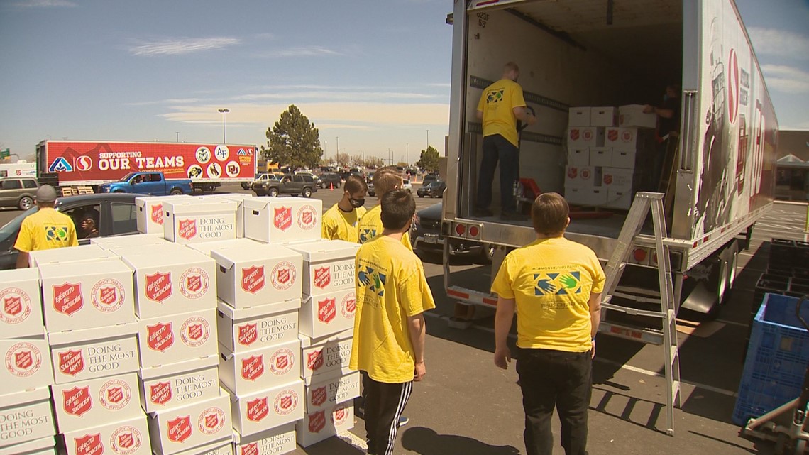 Largest food distribution drive-thru ever seen in Colorado | 9news.com