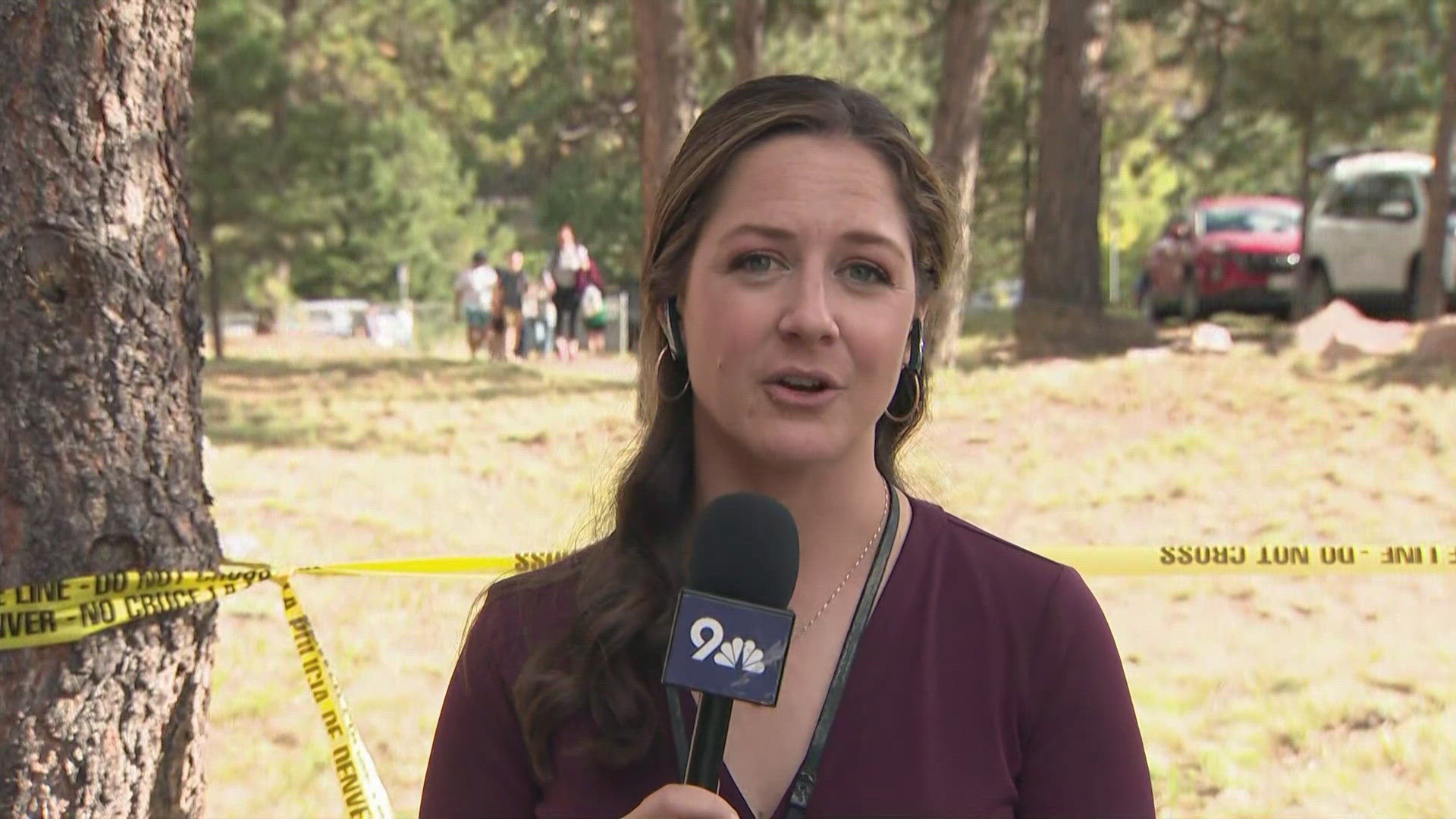 Families, neighbors gather at reunification point after Evergreen High School shooting | 9news.com