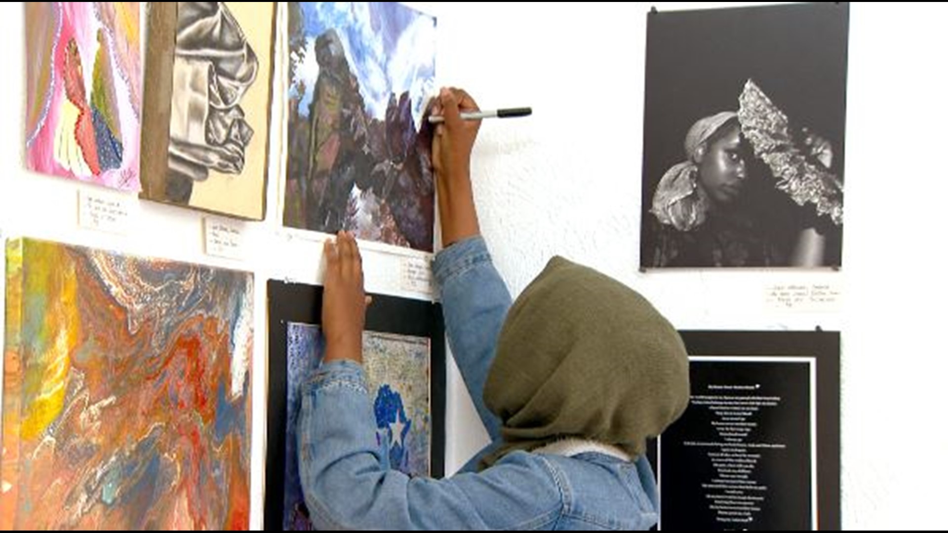 Art exhibit highlights refugee artists and their stories | 9news.com