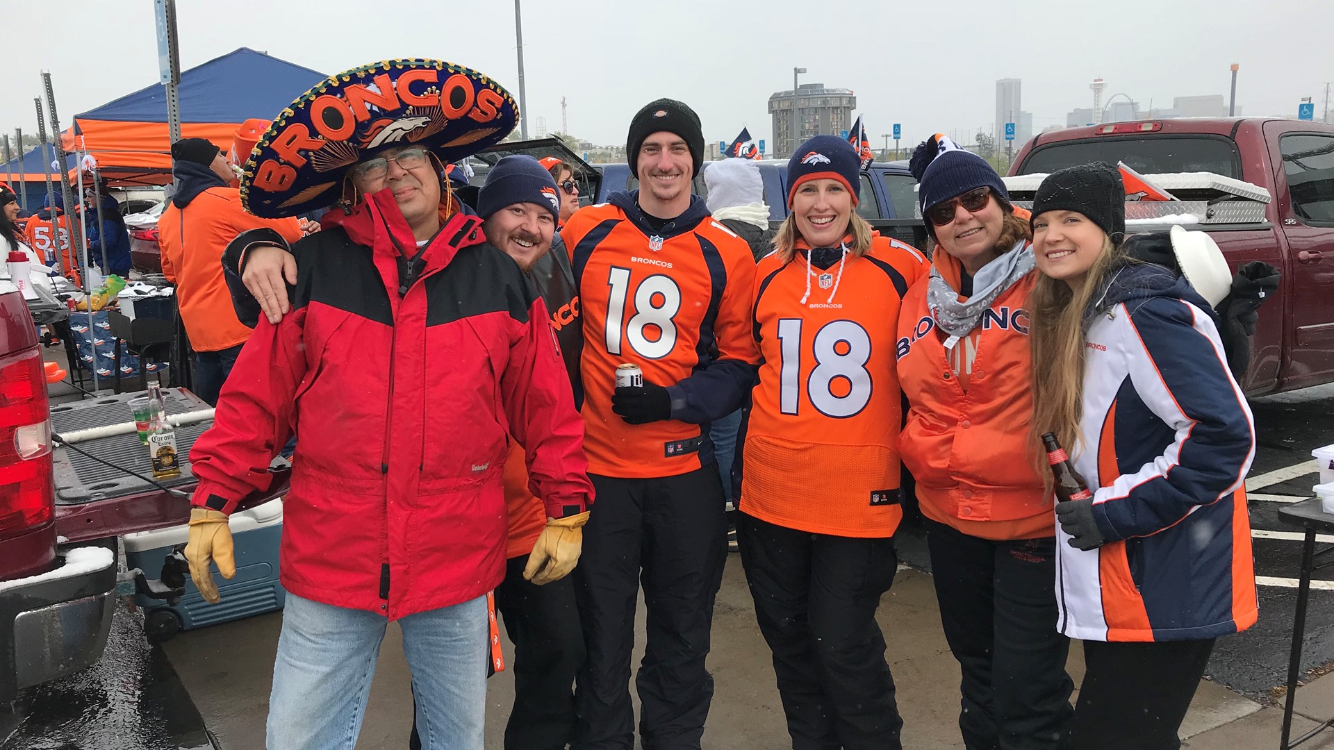 Hearty Broncos fans tailgate despite snow, freezing temps | 9news.com