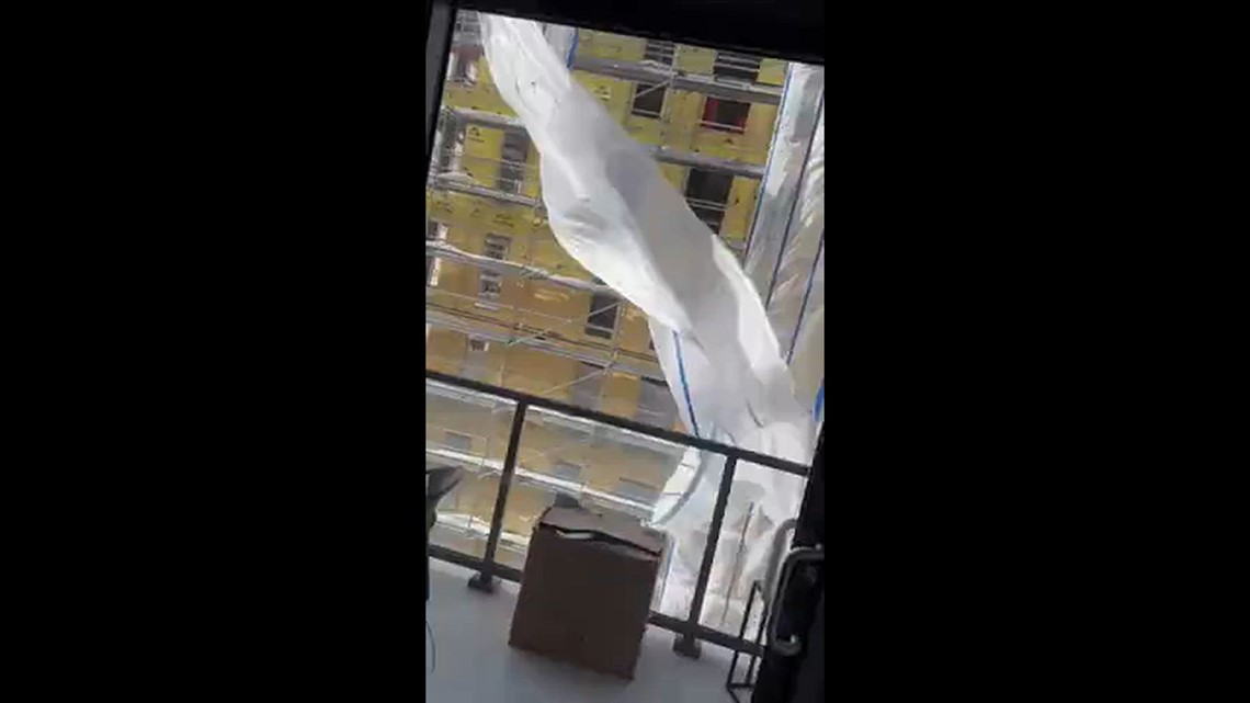 New construction tarps ripped off | 9news.com