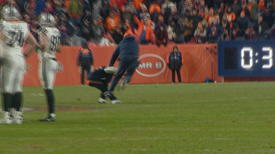 Denver Broncos security guard breaks ankle tacking fan | 9news.com