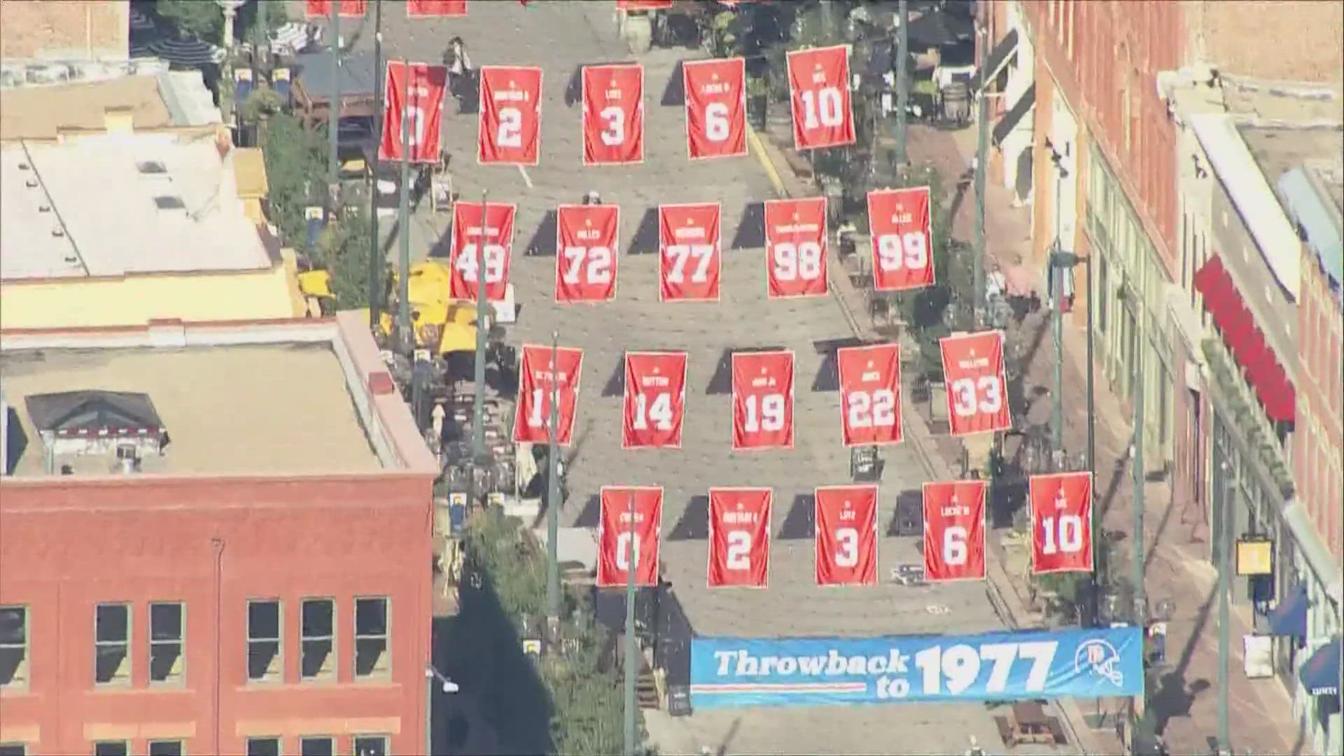 Broncos pride takes over Larimer Square ahead of playoff game | 9news.com
