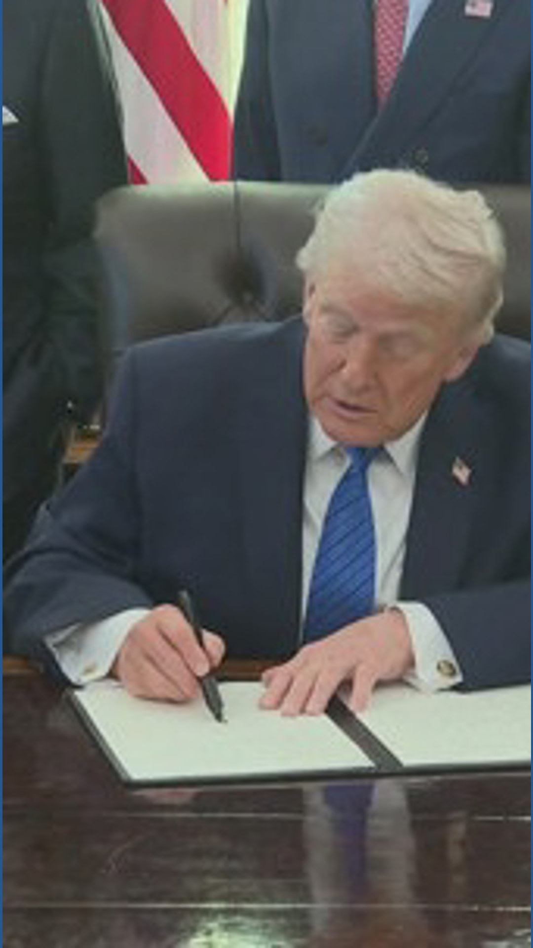 Present Trump signs executive order in preparation for Indy Car race ...