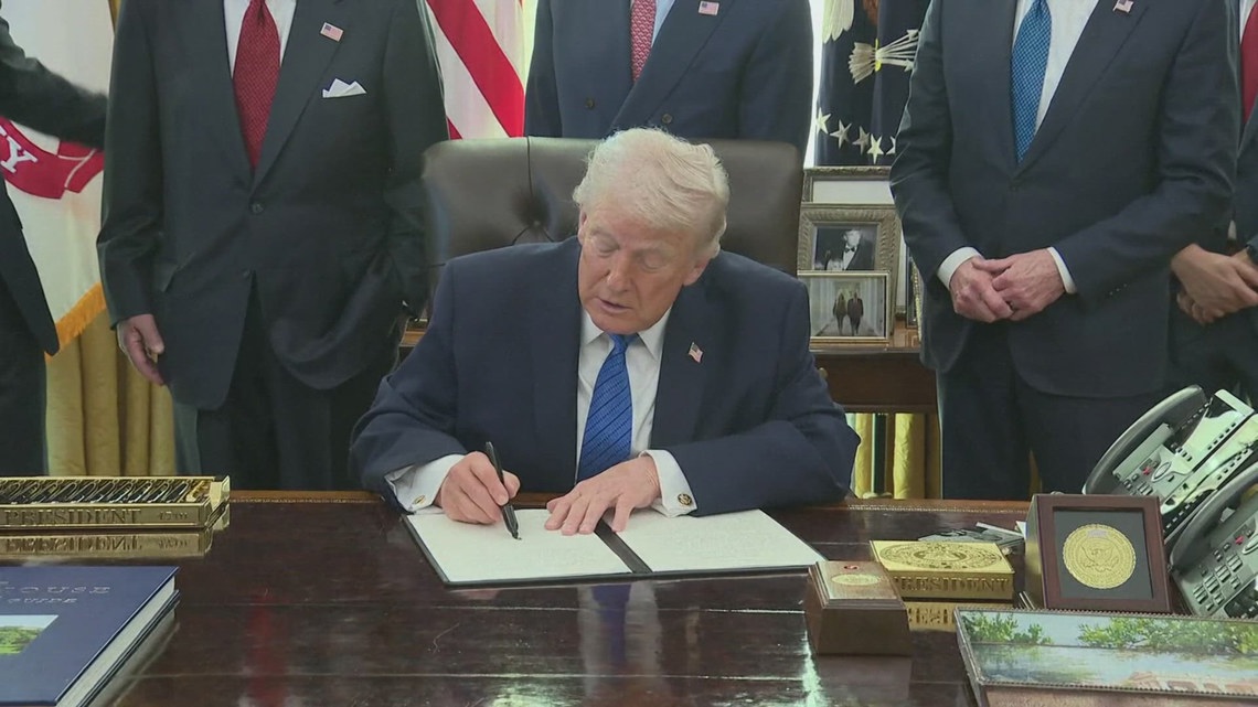 Present Trump signs executive order in preparation for Indy Car race ...