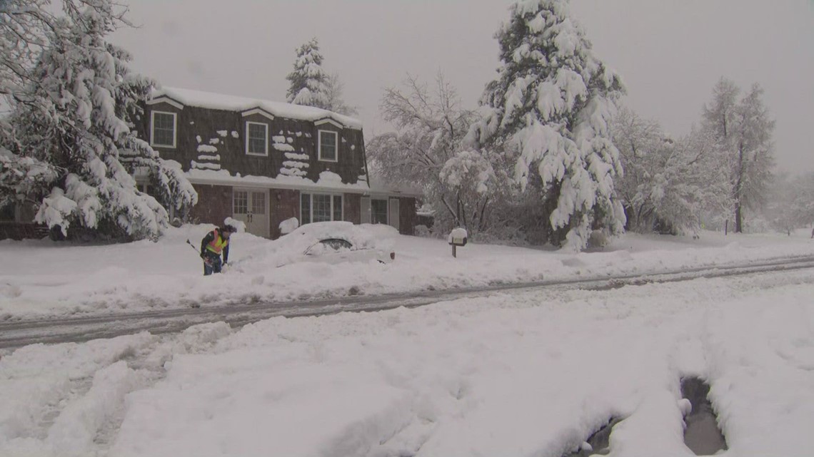 9NEWS reporter returns to clearing snow after sled wipeout | 9news.com