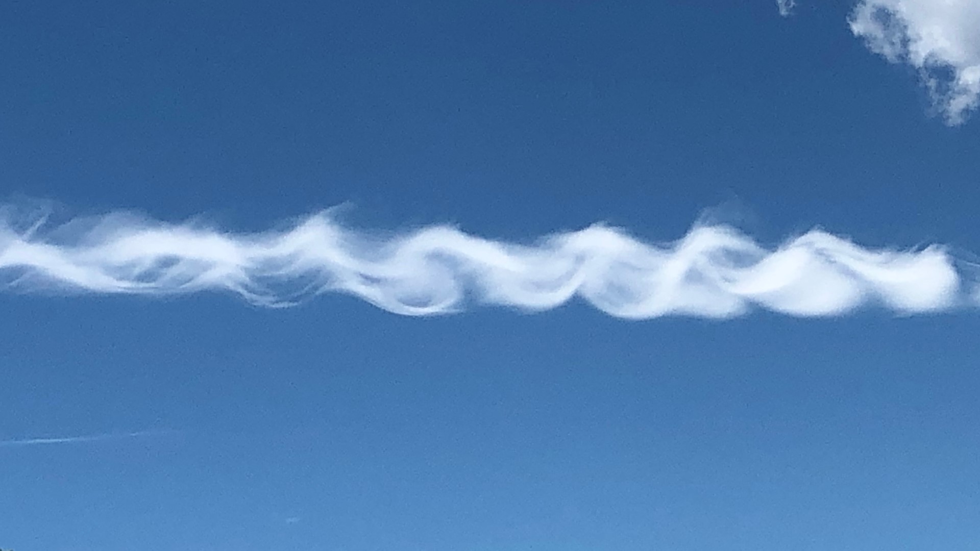 A bunch of people sent us photos of a cool spiral-shaped cloud over the ...