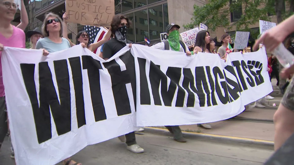 Denver immigrant rights advocates rally against ICE as enforcement ...