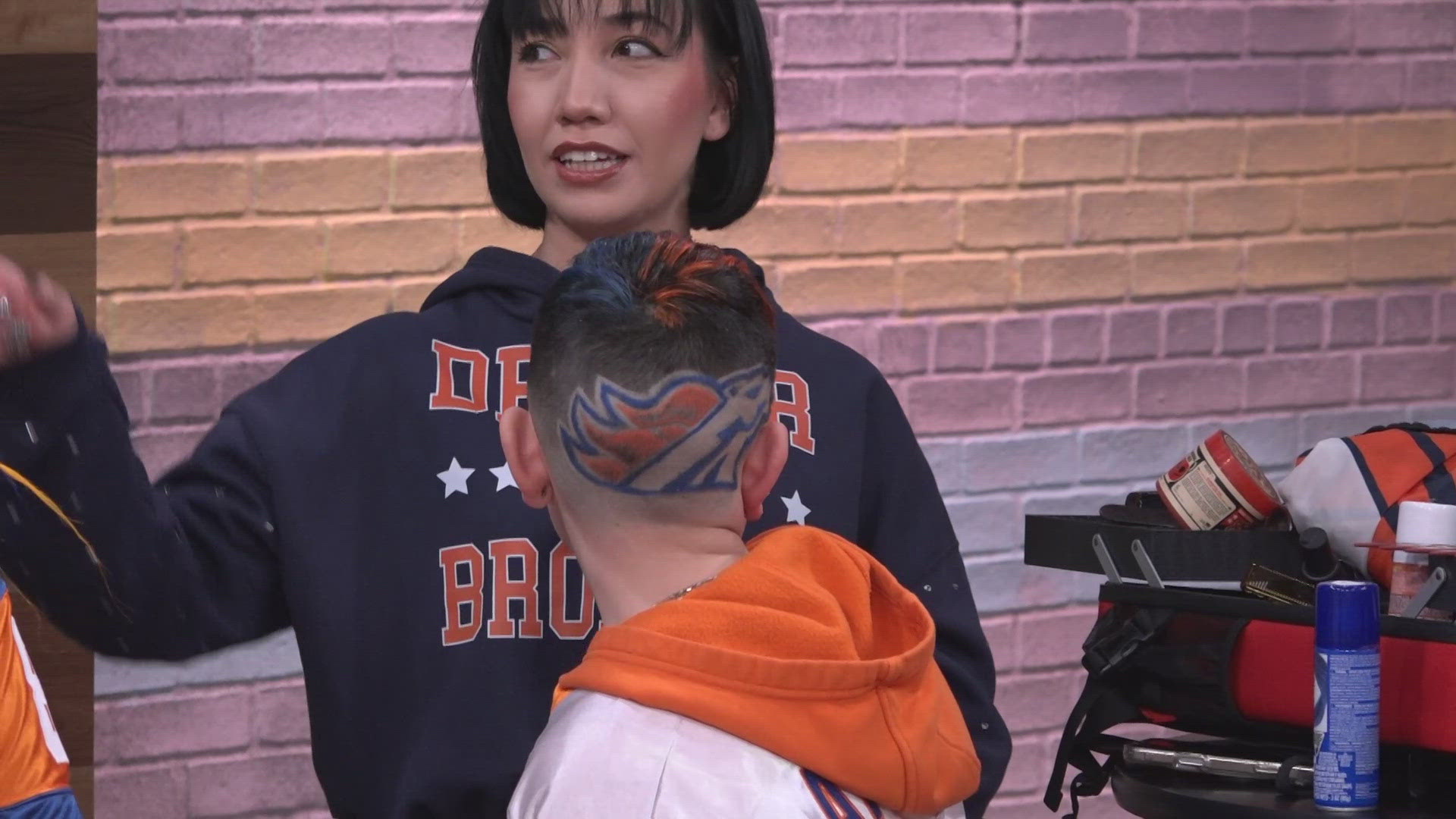 Orange and blue hairstyles help fans show their team spirit | 9news.com