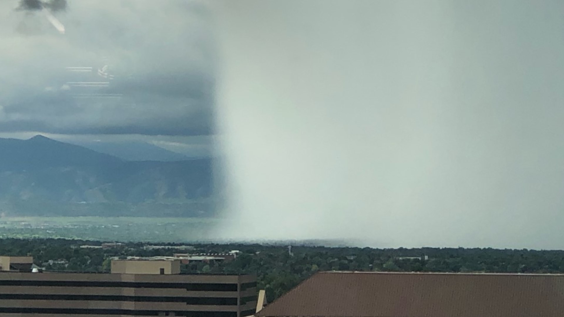 Photos: Very visible rain shaft approaches Denver | 9news.com