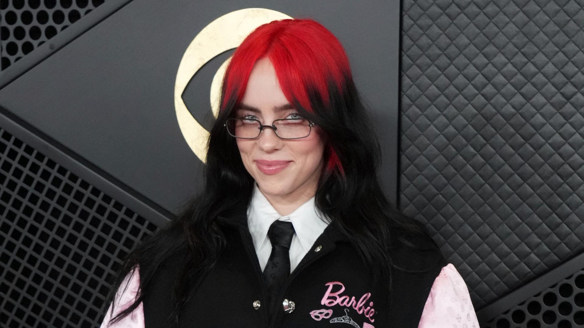Billie Eilish hugs pups during visit to Colorado rescue | 9news.com