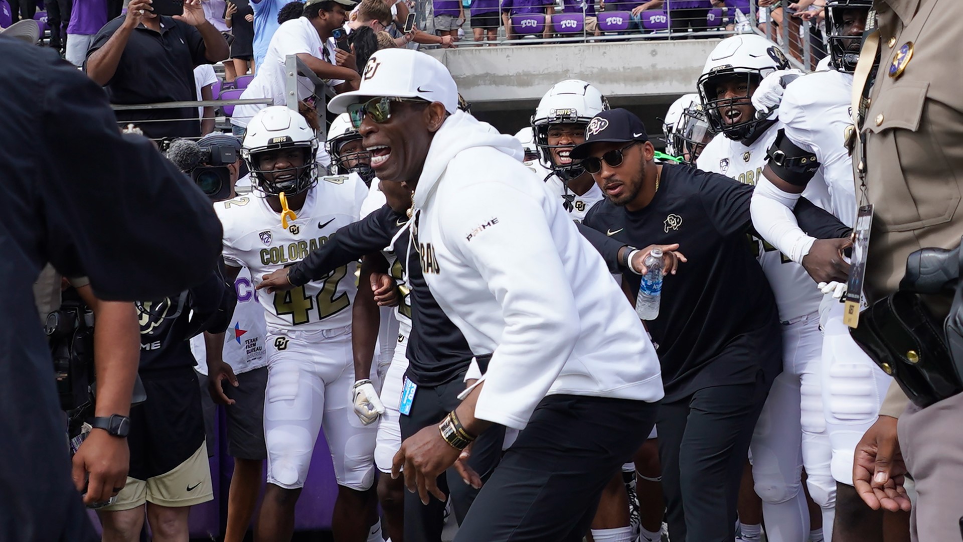 Coach Prime debuts new white and gold uniforms in Colorado debut ...