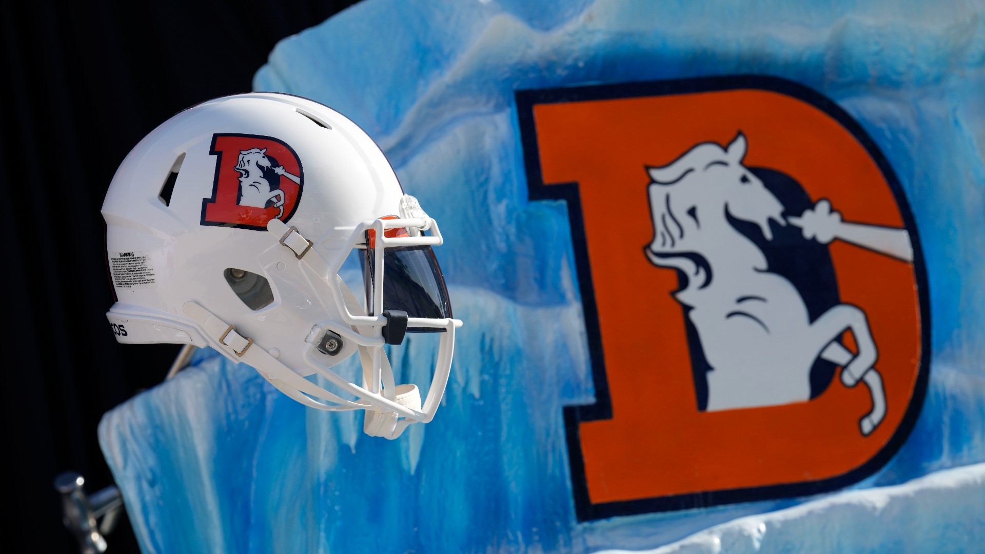 Broncos to wear 'snowcapped' helmets Sunday | 9news.com
