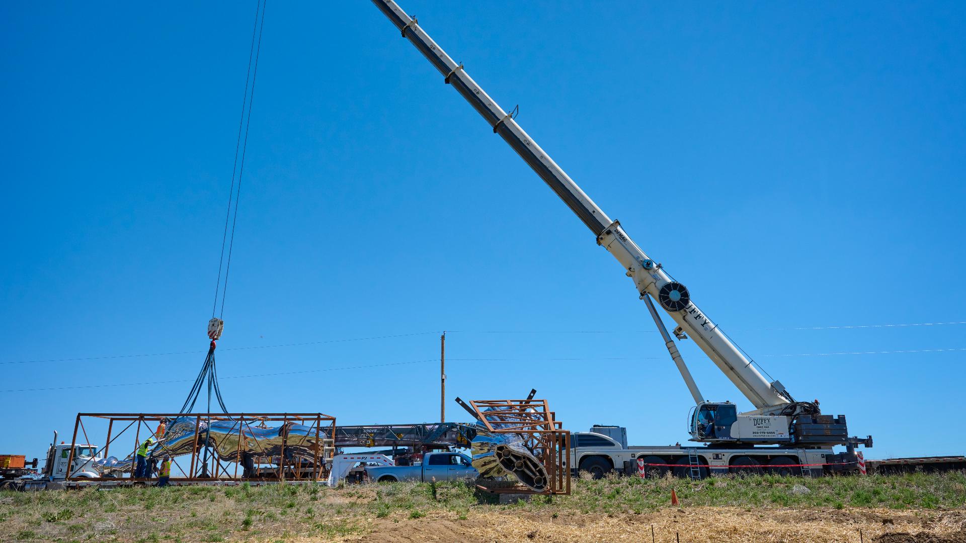 New 58-foot tall 'Liberty' art sculpture installed at The Aurora ...