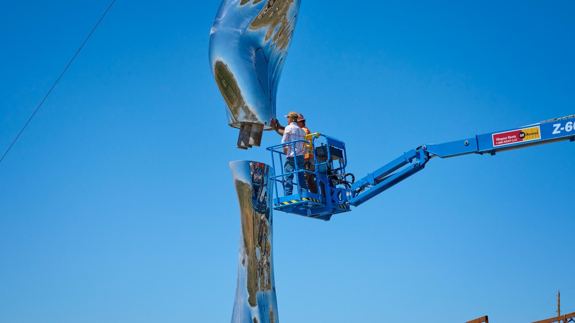 New 58-foot tall 'Liberty' art sculpture installed at The Aurora ...