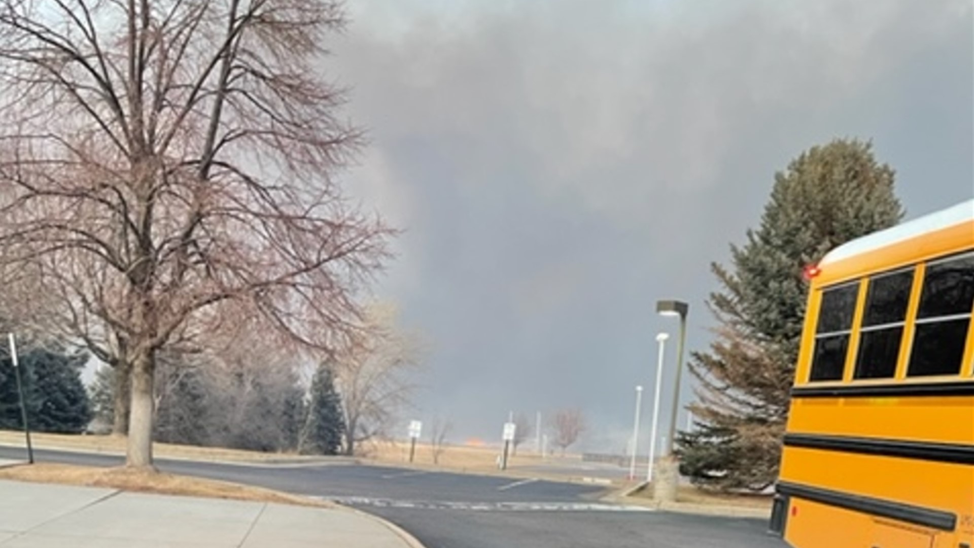PHOTOS: School buses drive through flames to help with Marshall Fire ...