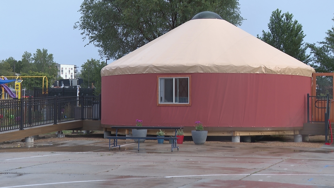 Students celebrate a yurt installation after facing racist slurs ...