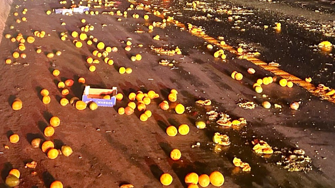 Oranges and mangoes spill all over Interstate 70 in Colorado | 9news.com