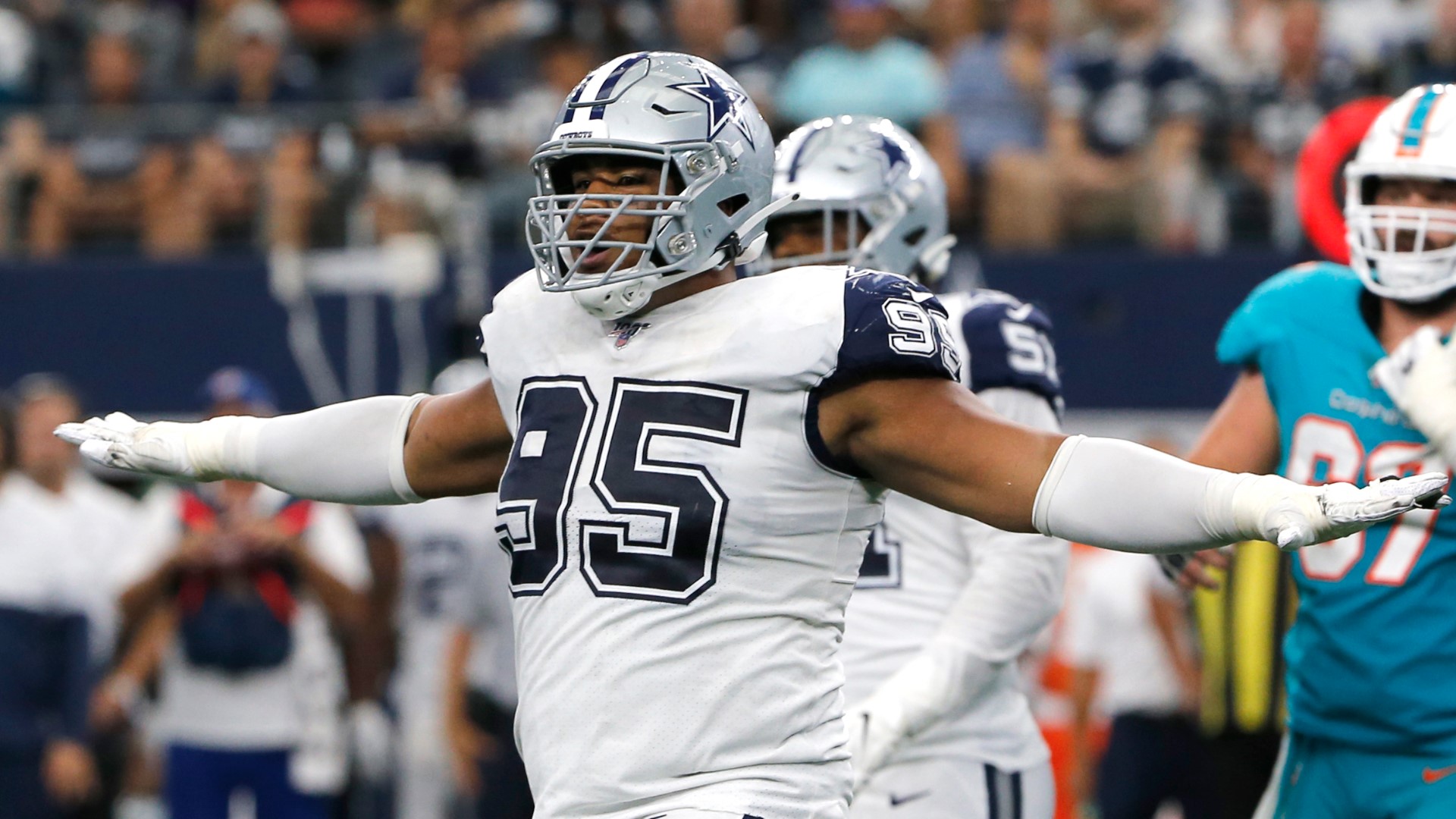 New Bronco Covington followed dad to professional football | 9news.com